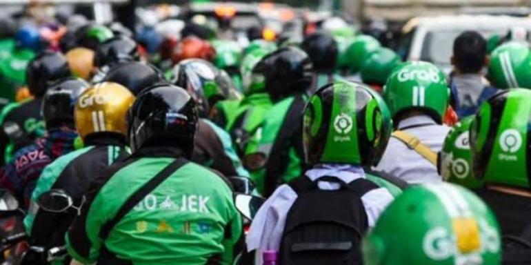KON Soroti Dampak Merger Grab-Gojek