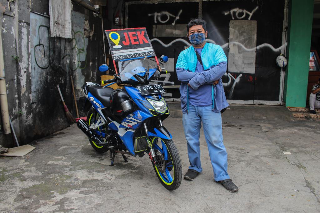 Opang Tetap Bertahan